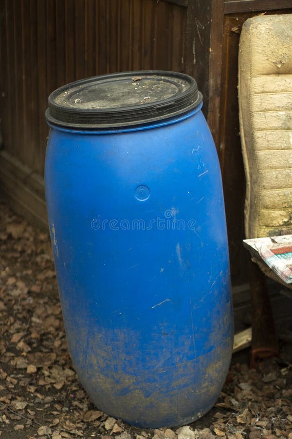 Blue Storage Barrel. the Oil Barrel is on the Ground Stock Photo ...
