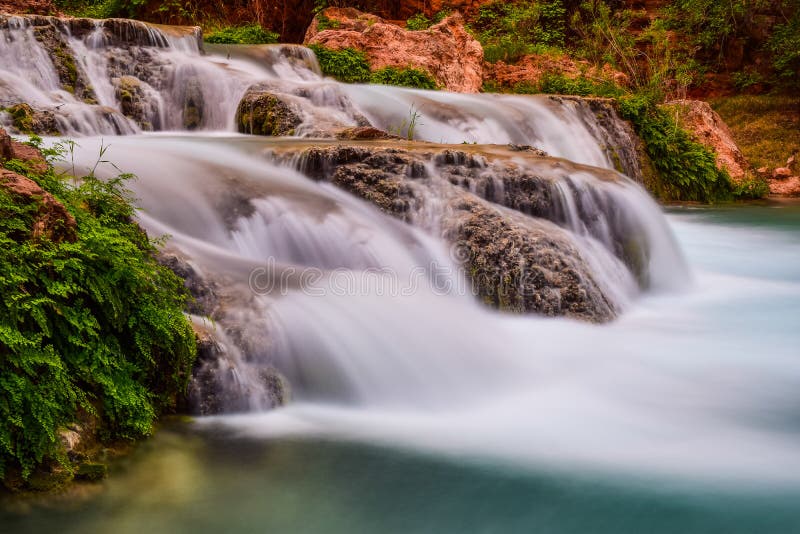 Blue stream stock photo. Image of falling, blue, canyon - 133063222