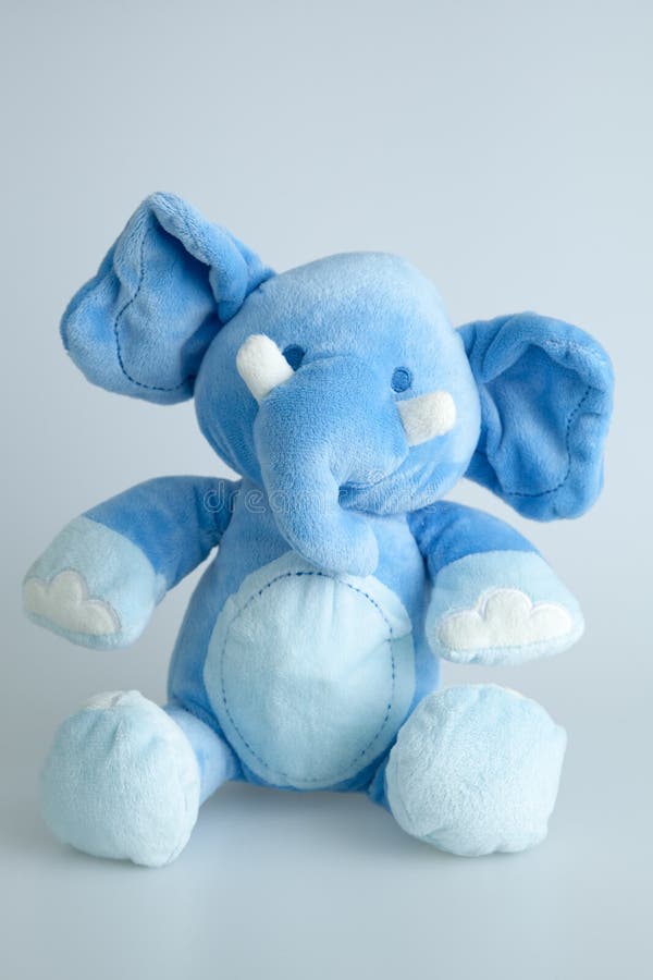 Blue stuffed elephant stock photo. Image of night, playful - 30323622