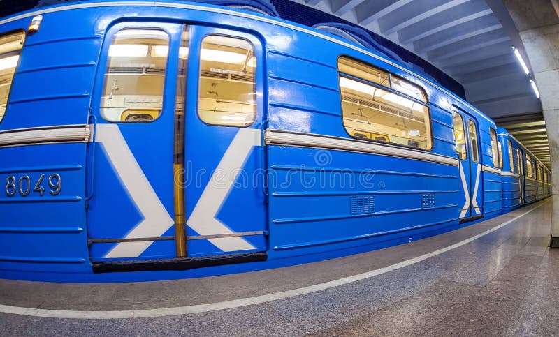 Blue Subway Train Standing at the Underground Station. Wide Angle ...