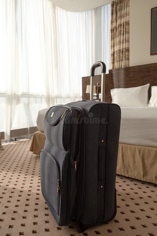 Blue Suitcase in the Hotel Room Stock Image - Image of baggage, living ...