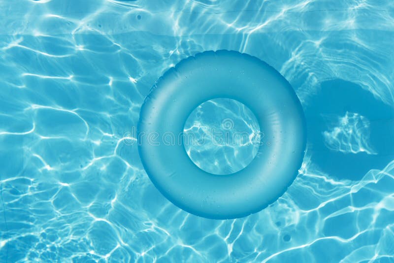 Blue Summer Pool Rubber Ring Floating on a Vacation Swimming Pool Stock ...