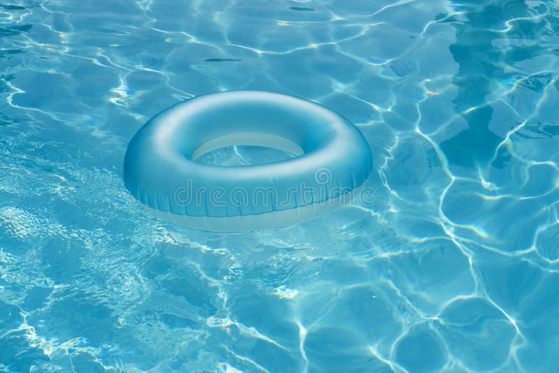 Blue Summer Pool Rubber Ring Floating on a Vacation Swimming Pool Stock ...