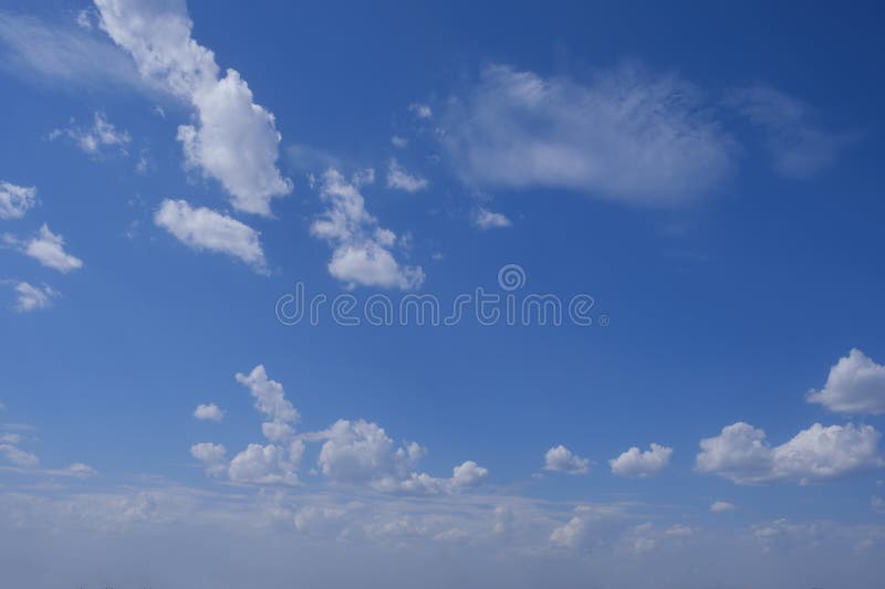 Blue of the Summer Sky with Light Feathery Clouds Stock Image - Image ...