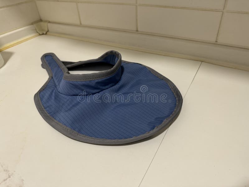 Blue Sun Visor Hat on Countertop Stock Image - Image of style, indoors ...