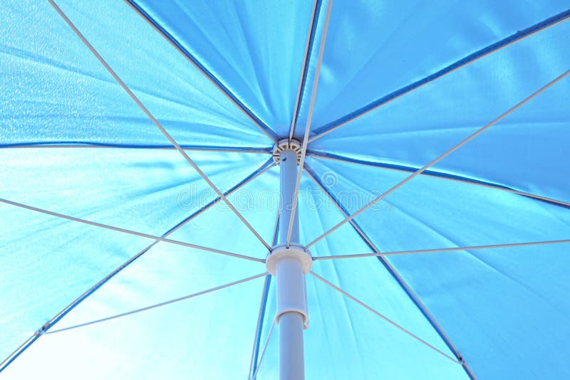 Blue sunblock umbrella stock image. Image of blue, vacation - 31731337
