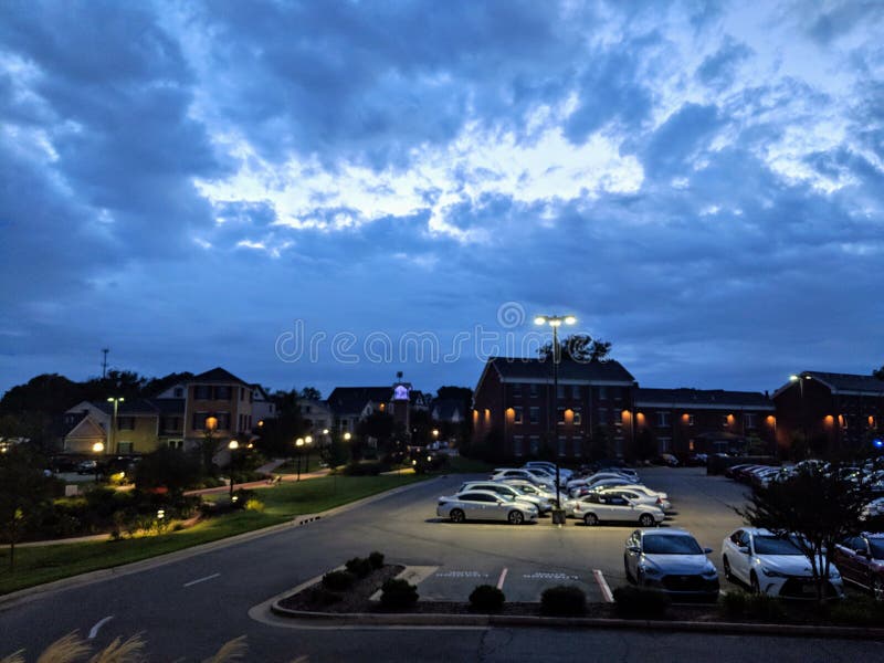 Blue Sunset Over a Parking Lot Stock Image - Image of town, horizon ...