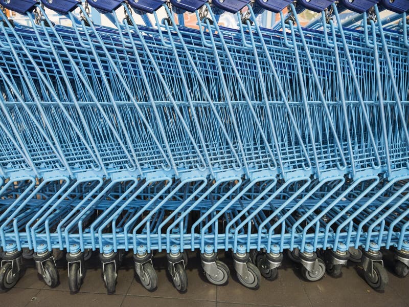 Blue supermarket carts stock photo. Image of push, commerce - 141378628