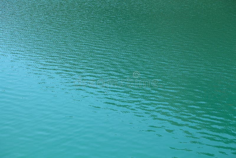 Blue surface of a lake stock image. Image of water, azure - 75097721