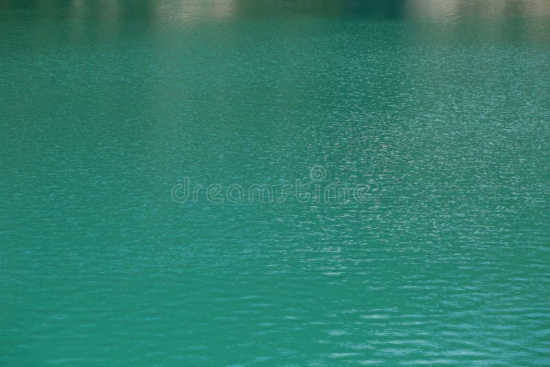 Blue surface of a lake stock image. Image of shinning - 75098933