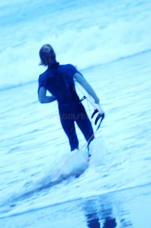 Blue Surfers 9 stock image. Image of sports, male, surfer - 214845