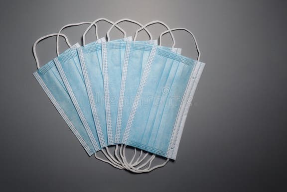 Blue Surgery Mask on Gray Background Stock Photo - Image of care, blue ...