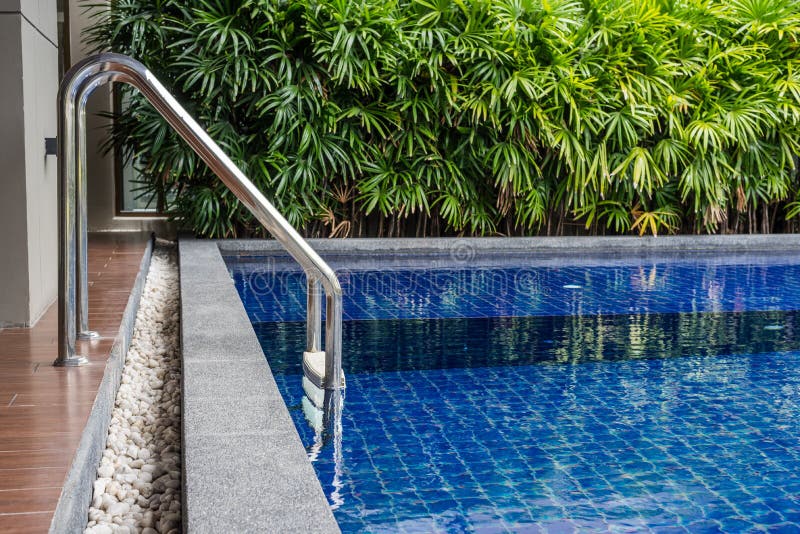 Blue swimming pool stock photo. Image of pool, resort - 104528260