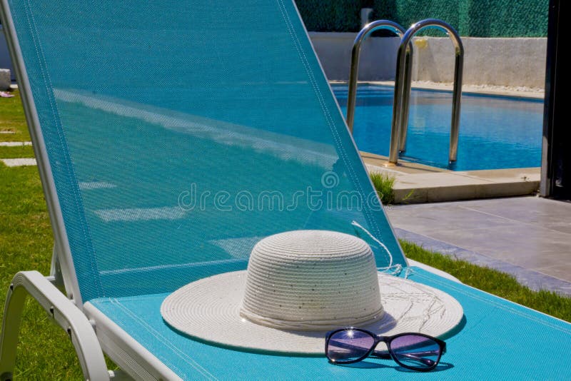 Blue Swimming Pool and Lounge Chair in Resort Stock Image - Image of ...