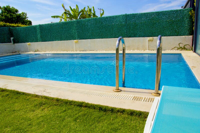 Blue Swimming Pool in a Resort in Summer Stock Image - Image of ...