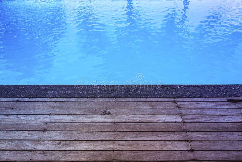 Blue Swimming Pool Summer Vacation and Wooden Deck Stock Image - Image ...
