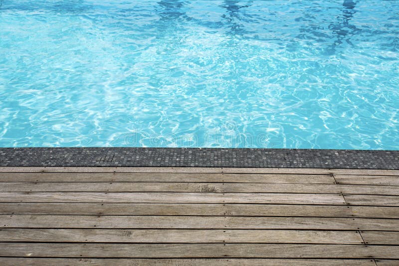 Blue Swimming Pool Summer Vacation and Wooden Deck Stock Image - Image ...