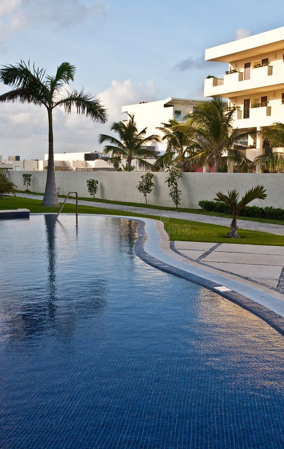 Blue Swimming Pool in a Tropical Setting Stock Photo - Image of ...