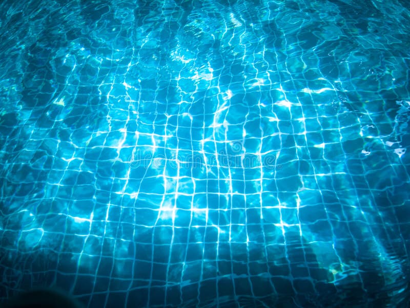Blue Swimming Pool Water, with Waves, and Reflections from Sunlight ...