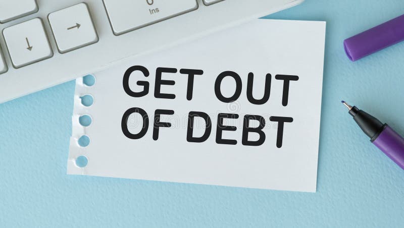 On the Blue Table are Paper, Note Paper with Text - Get Out of Debt ...