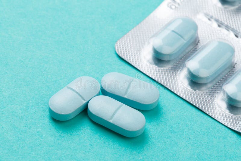 Blue Tablets on Blue Background - Image Stock Photo - Image of illness ...