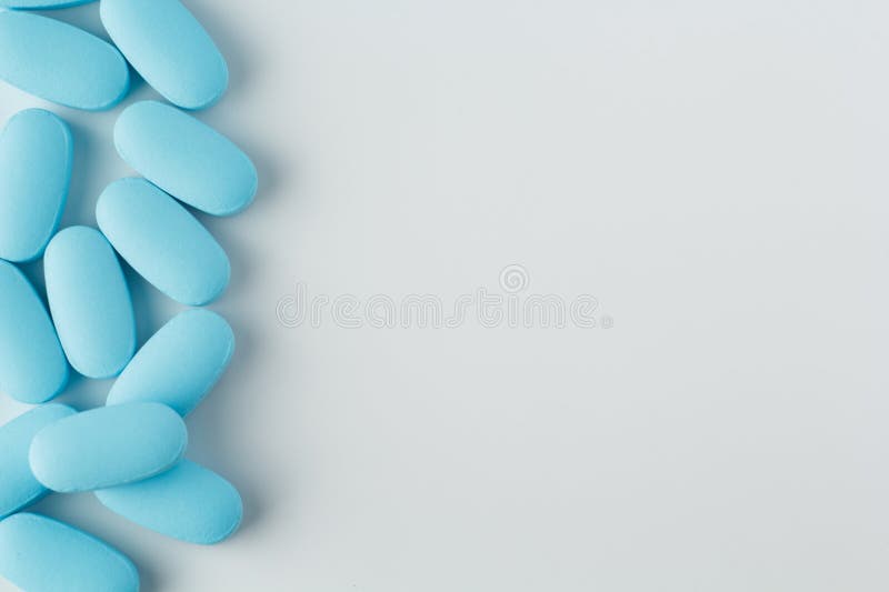 Blue Tablets on a Light Background, Vitamins and Medicines Stock Image ...