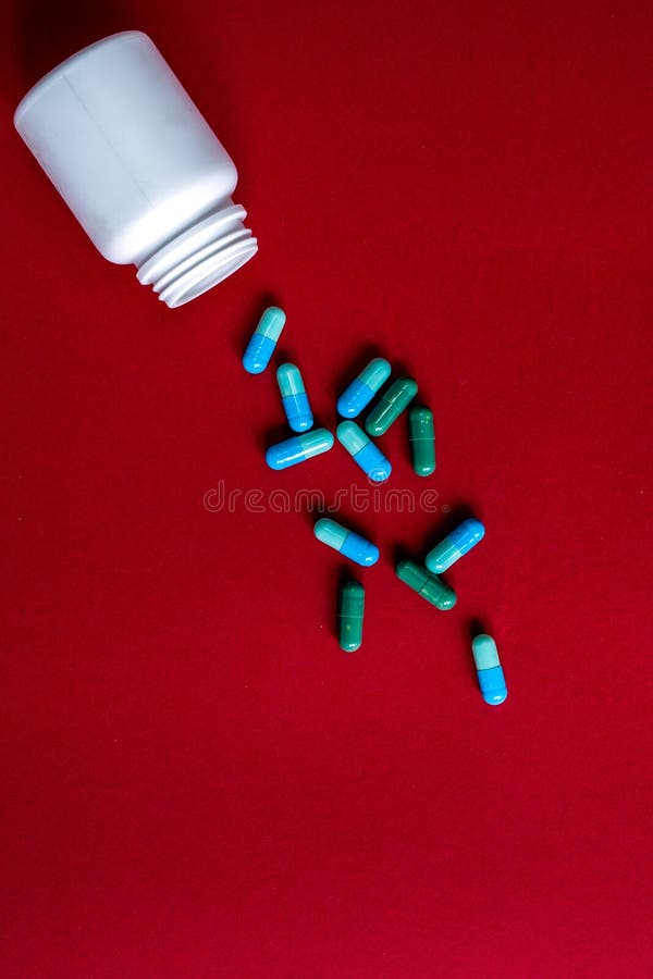 Blue Tablets in Plastic Container Top View Stock Photo - Image of ...