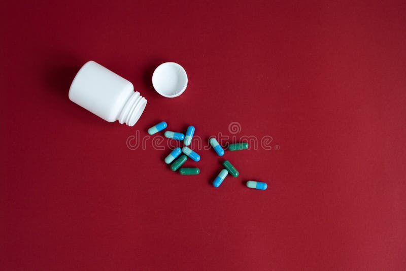 Blue Tablets in Plastic Container Top View Stock Photo - Image of ...