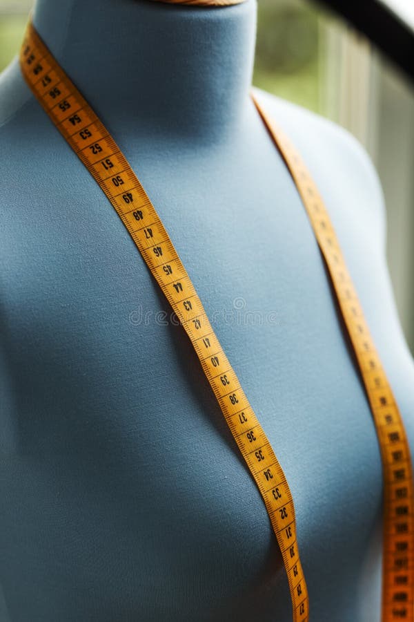 Blue Tailor Dummy with Measuring Tape Close Up Photo. Stock Image ...