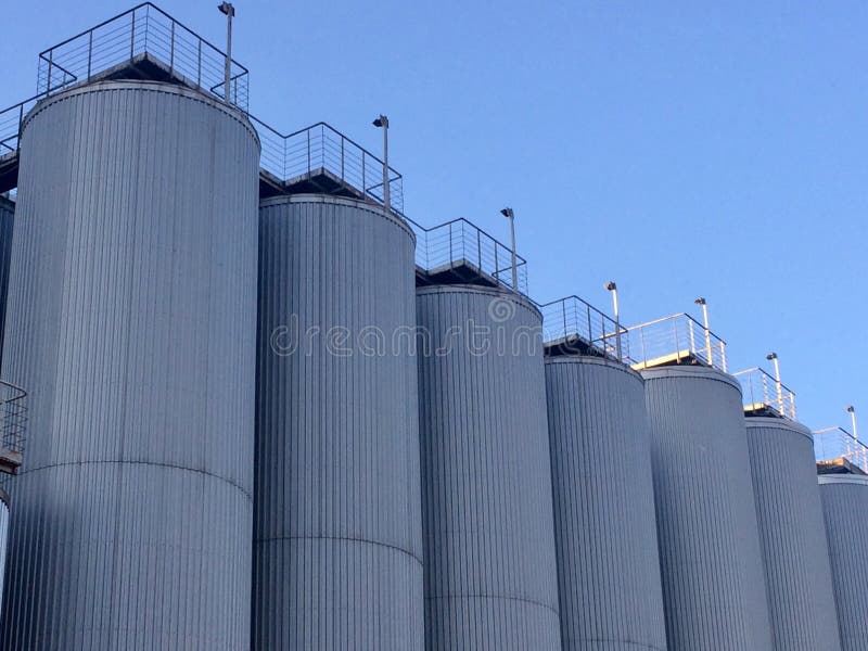 Blue tanks stock image. Image of beer, blue, silver - 126599915