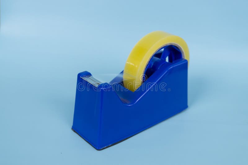 Blue Tape Dispenser with Transparent Tape Isolated on Blue Background ...