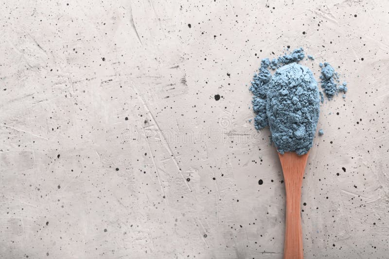 Blue Tea Matcha in a Spoon on Concrete Surface with Copy Space Stock ...