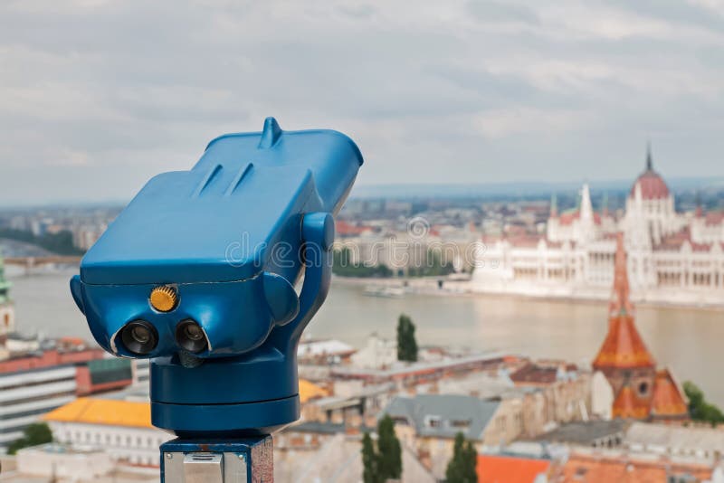 Blue Telescope And Blurred City On Background. Stock Image - Image of ...