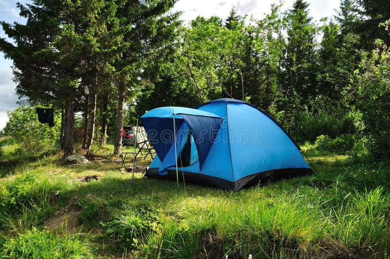Blue tent in a forest stock image. Image of tent, ural - 15437823