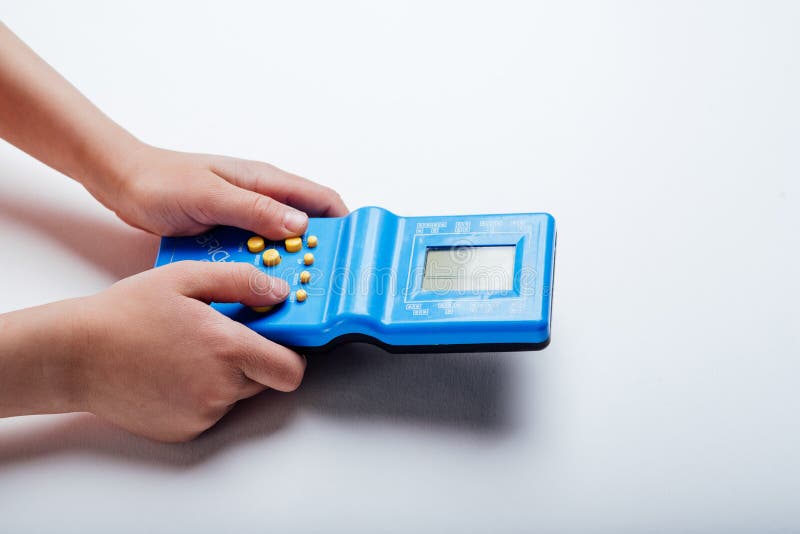 Child With Blue Tetris In Child Hand, Isolated On White Background ...