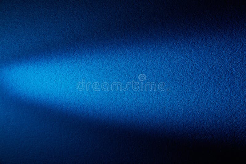 Cone-shaped Light Blue Ray of Light on a Blue Textural Background Stock ...