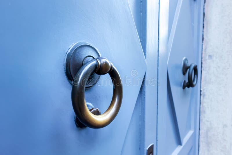 Blue Textured Door with Circular Gold Metal Handle Stock Image - Image ...