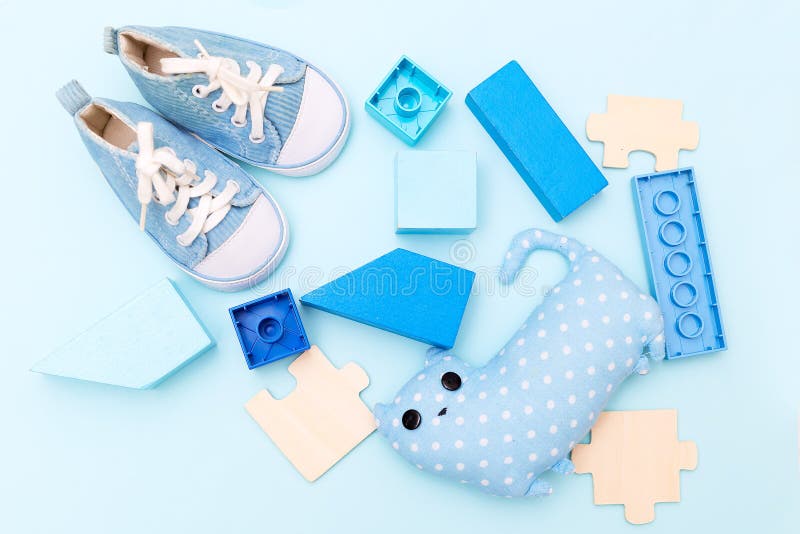 Set of Blue Things for Sports and White Headphones for Music Lie on ...