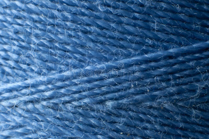Blue Thread Spooled Up on a Yarn Spool Stock Image - Image of macro ...