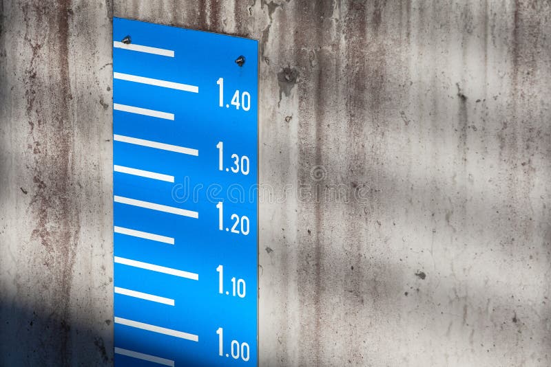 Blue Tide Level Measurement Scale on Concrete Wall Stock Photo - Image ...