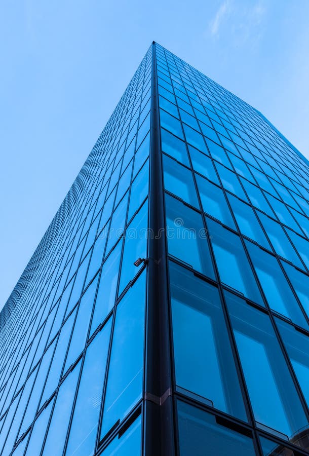 Blue Tinted Night Shot of the Glass and Steel Front of an Office ...