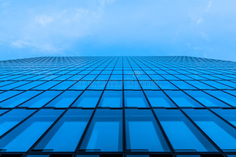 Blue Tinted Night Shot of the Glass and Steel Front of an Office ...