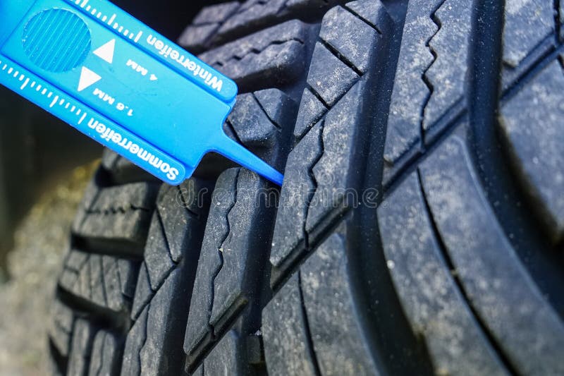 A Blue Tire Tread Depth Gauge for Measuring the Tire Tread Stock Image ...