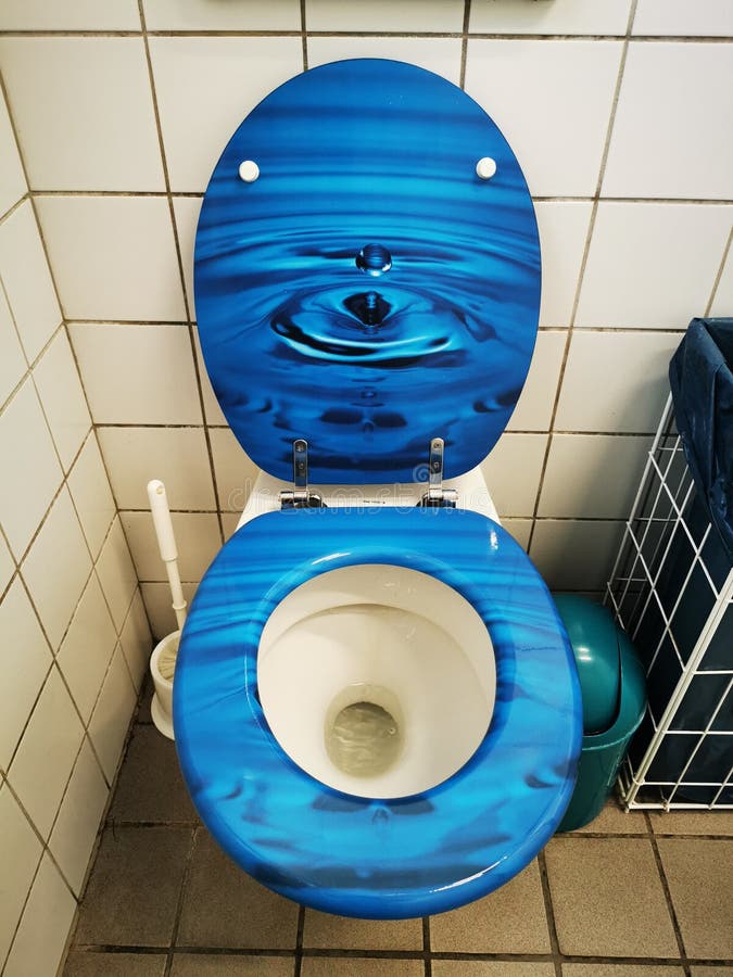 Blue Toilet in a White Room Stock Image - Image of restroom, toilet ...