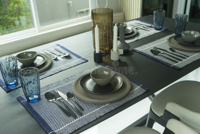 Modern Style of Plate Setting on Dining Table Stock Image - Image of ...