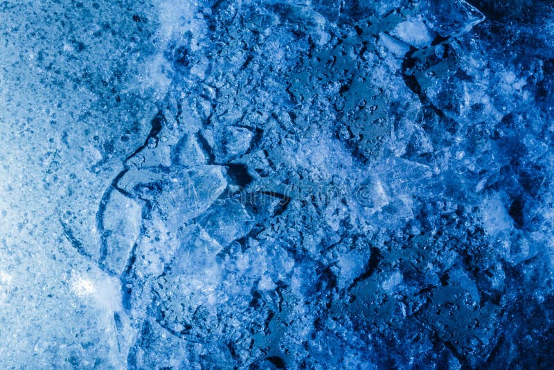 Blue Toned Frozen Cracked Ice with Snow Texture Stock Photo - Image of ...