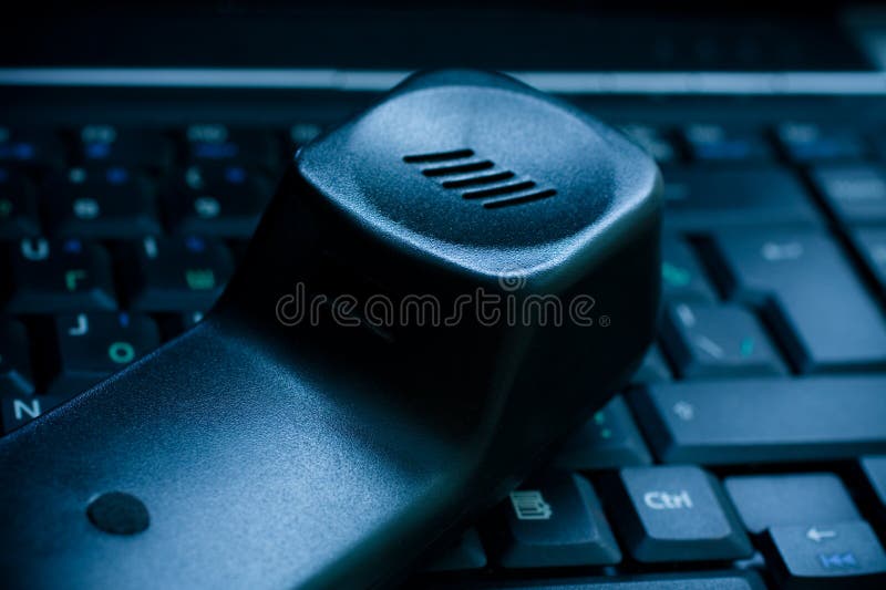Blue Toned Phone Receiver On Keyboard Stock Image - Image of technology ...