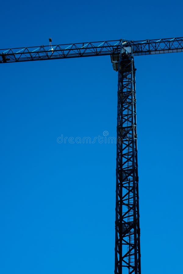 The Blue Tower Crane Against Blue Sky Stock Image - Image of crane ...
