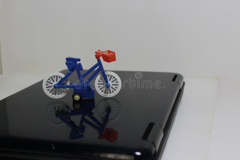 Blue Toy Bike with Black and White Backgroun Stock Photo - Image of ...
