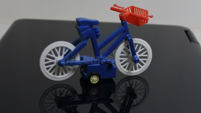 Blue Toy Bike with Black and White Backgroun Stock Photo - Image of ...